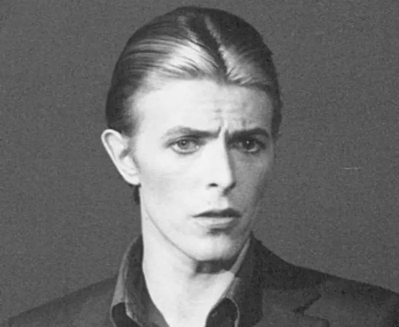 Toe David Bowie en Brian Eno in die geheim met Devo gejammer het