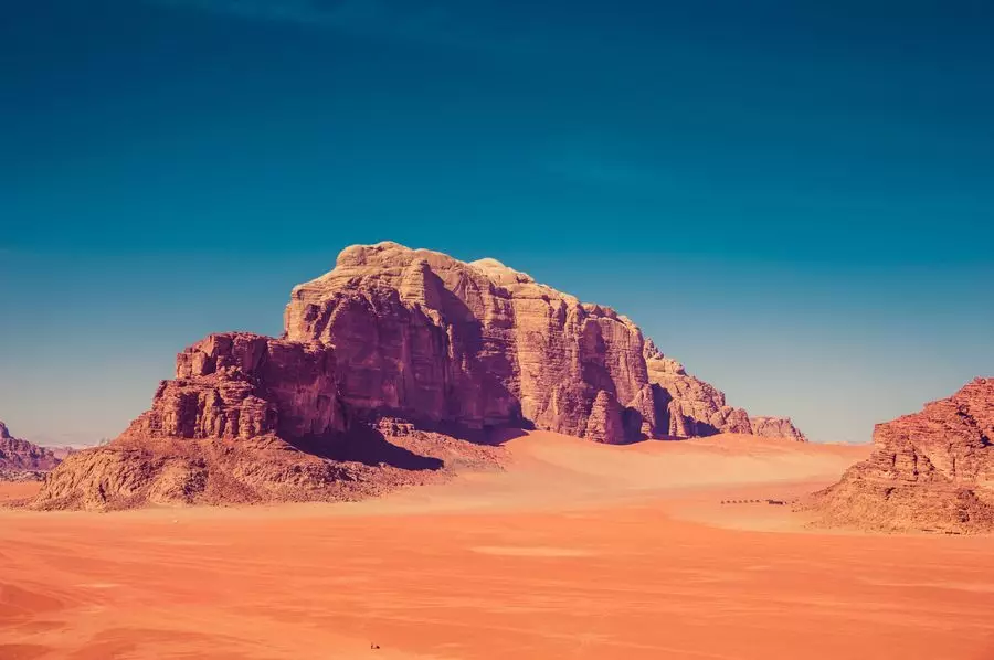 Wadi Rum, d'Jordan Wüst benotzt als eng anerweltlech Filmplaz